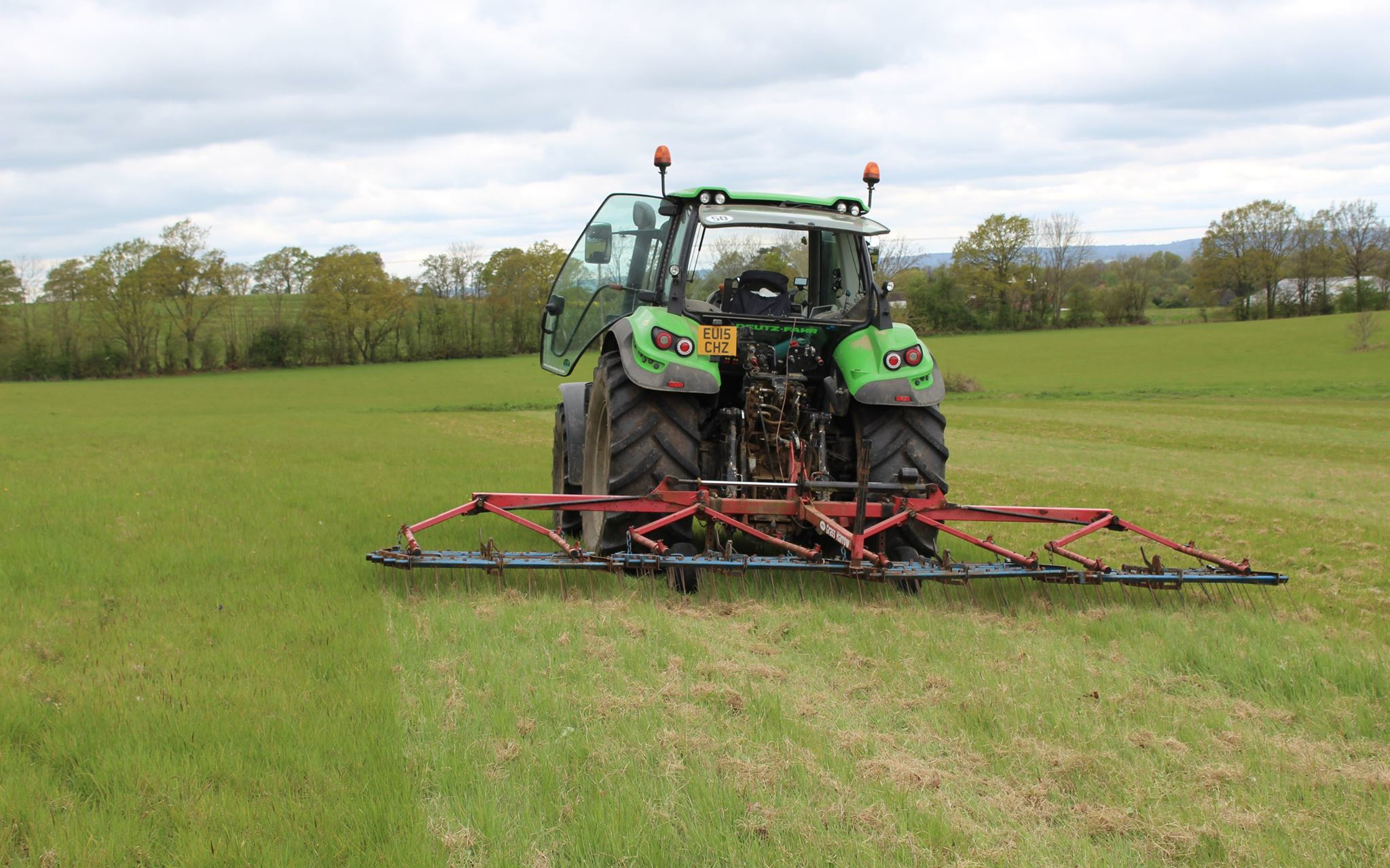 Spring tine harrowing - Belsham farming